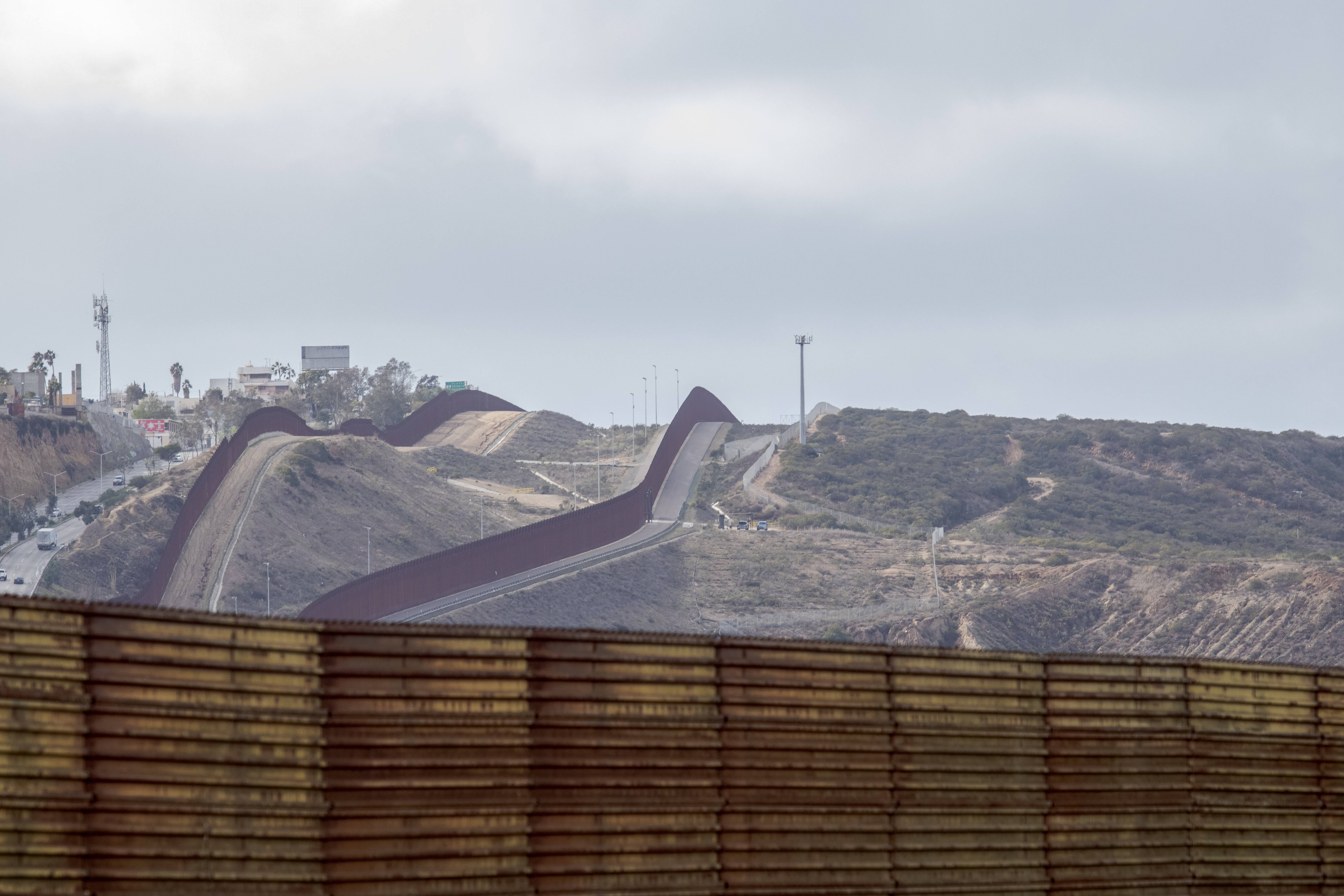 San Diego Tijuana Border Wall Falls From Higher Border Walls Overwhelm
